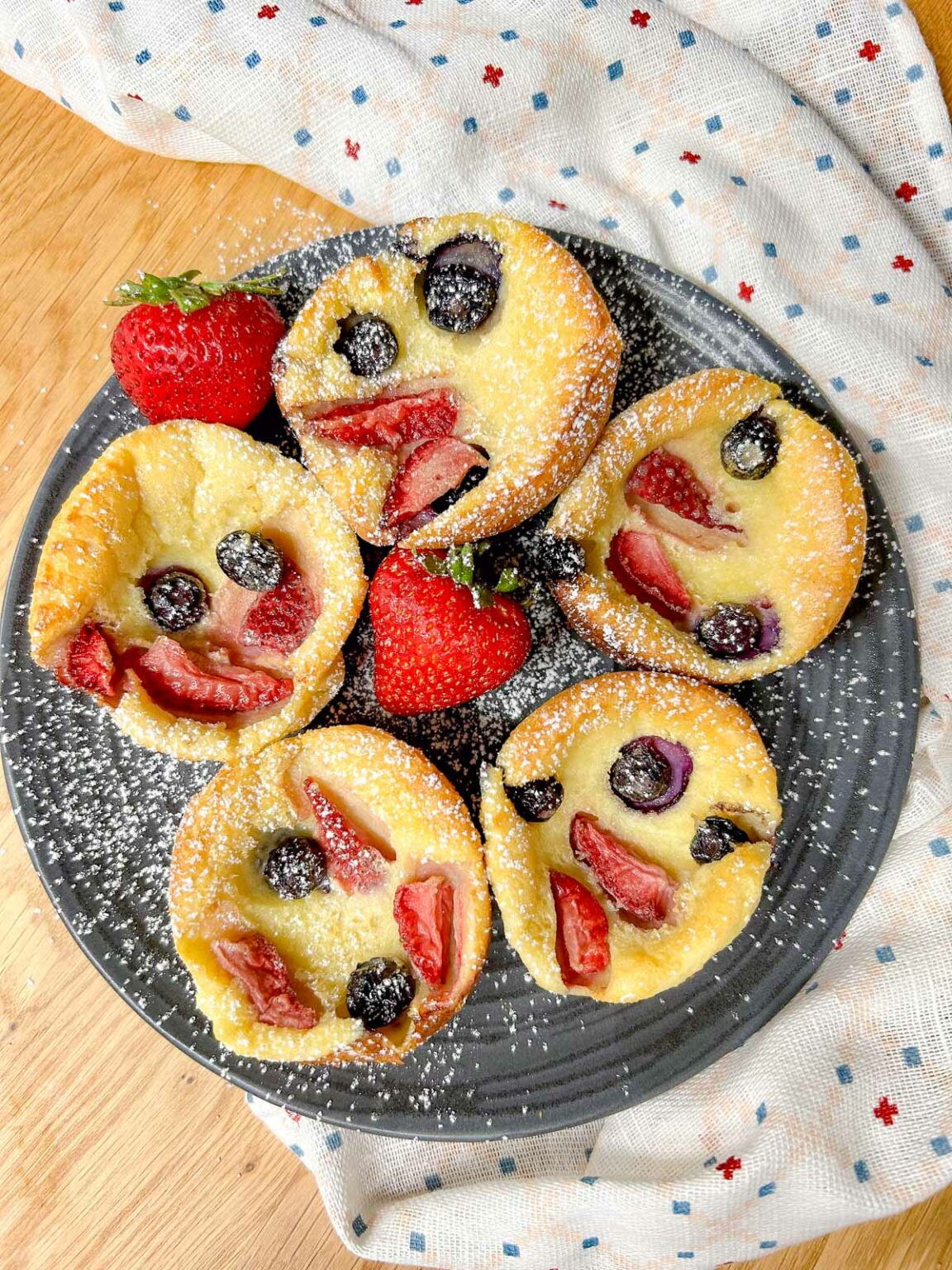 Mini Berry Dutch Babies - Easy and Delicious - fed by sab